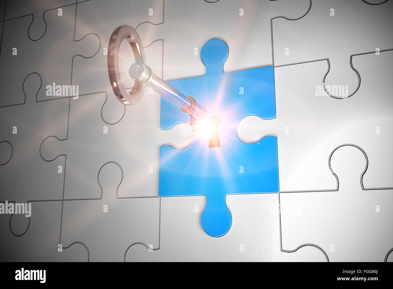 Key unlocking jigsaw Stock Photo - Alamy