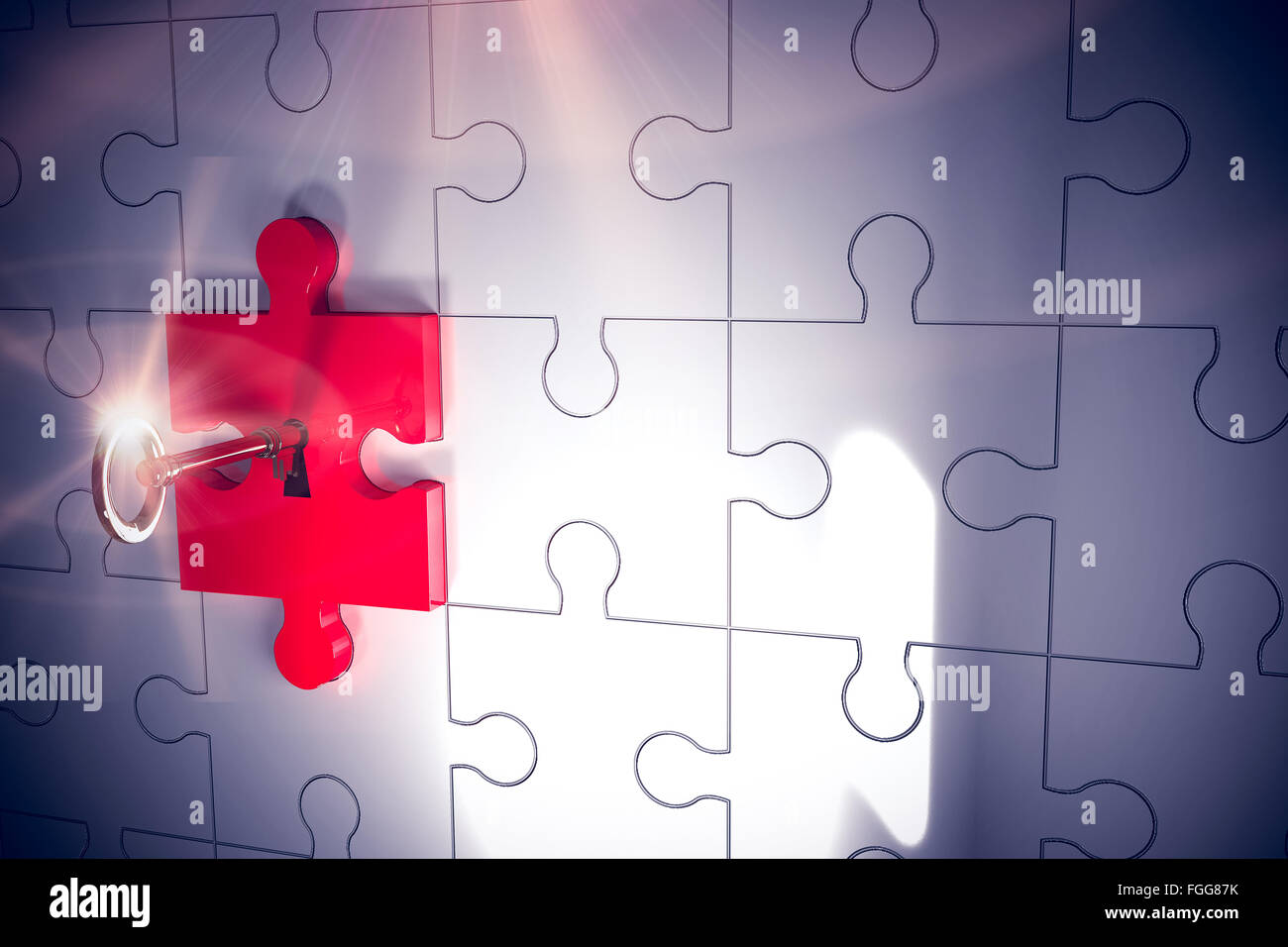 Key unlocking jigsaw Stock Photo - Alamy