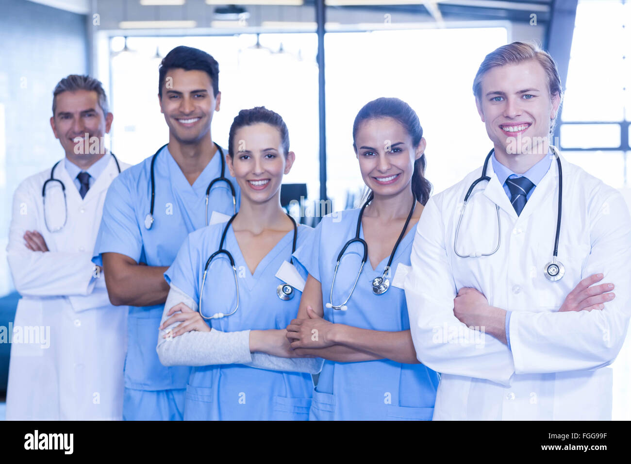 Portrait of medical team standing with arms crossed Stock Photo - Alamy