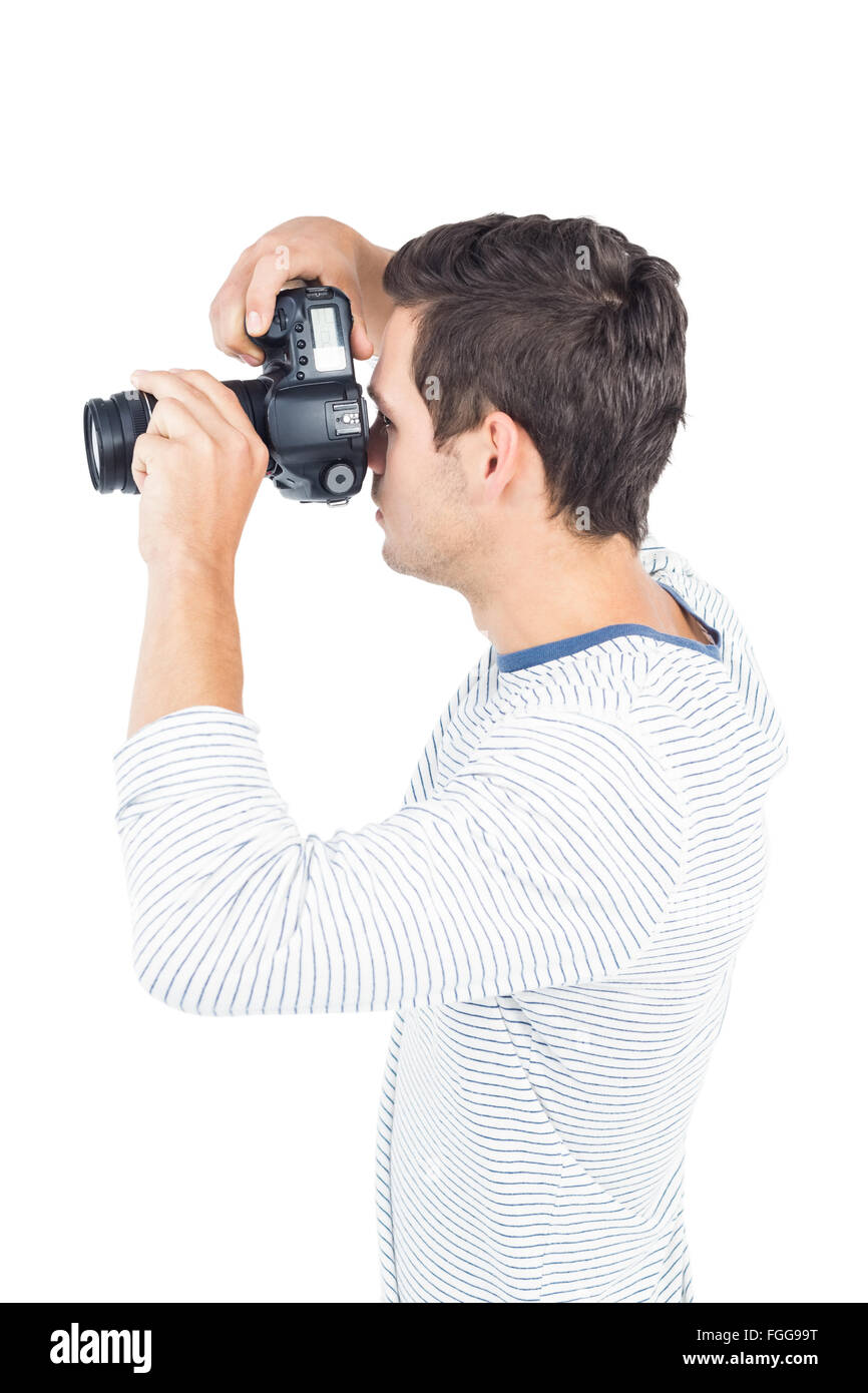 Man taking picture with professional camera Stock Photo - Alamy