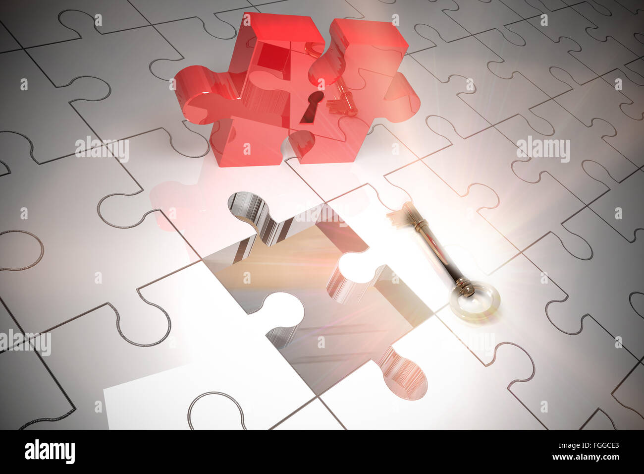 Key unlocking jigsaw Stock Photo - Alamy