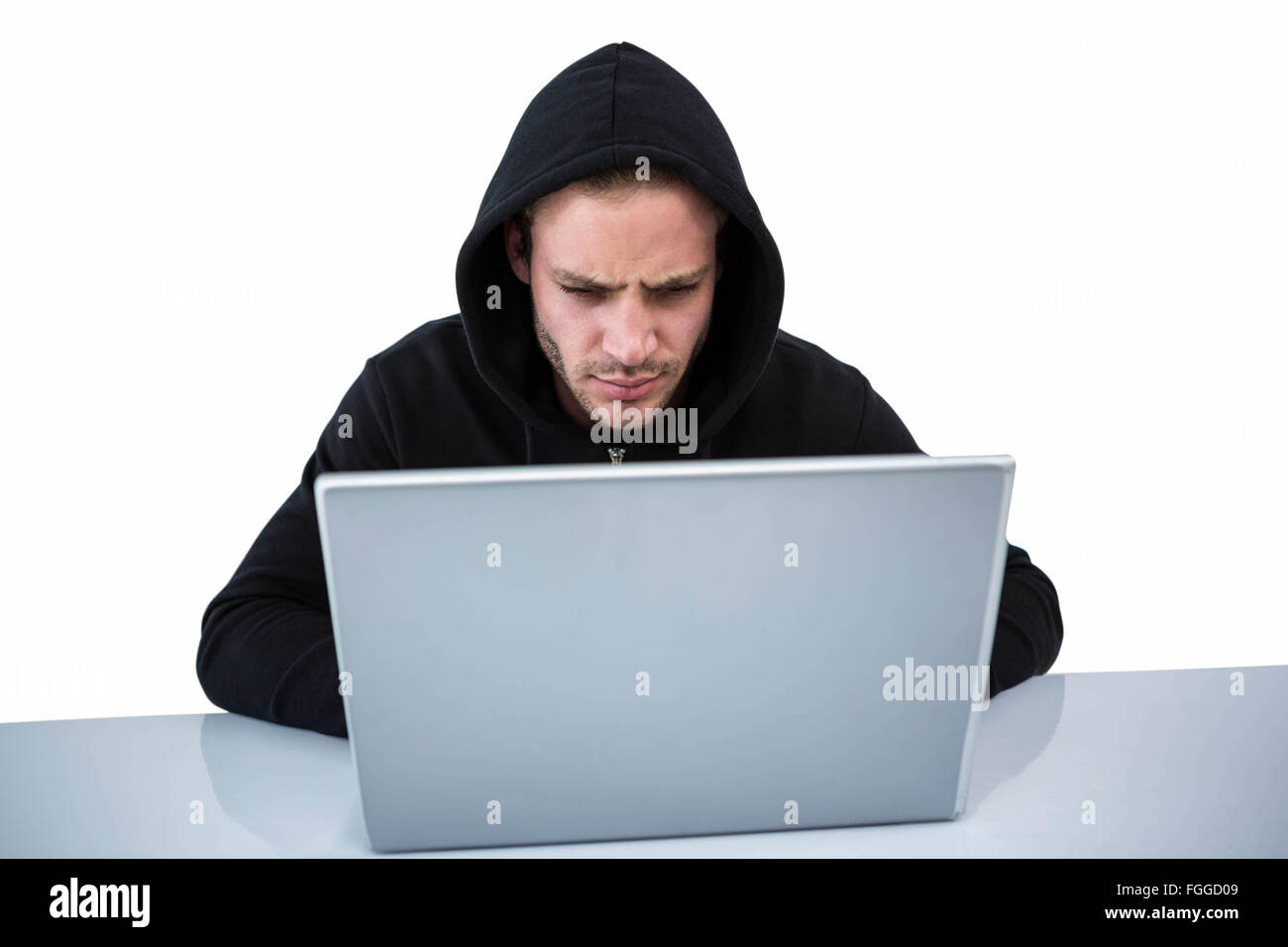 Handsome man in black hoodie using laptop Stock Photo - Alamy