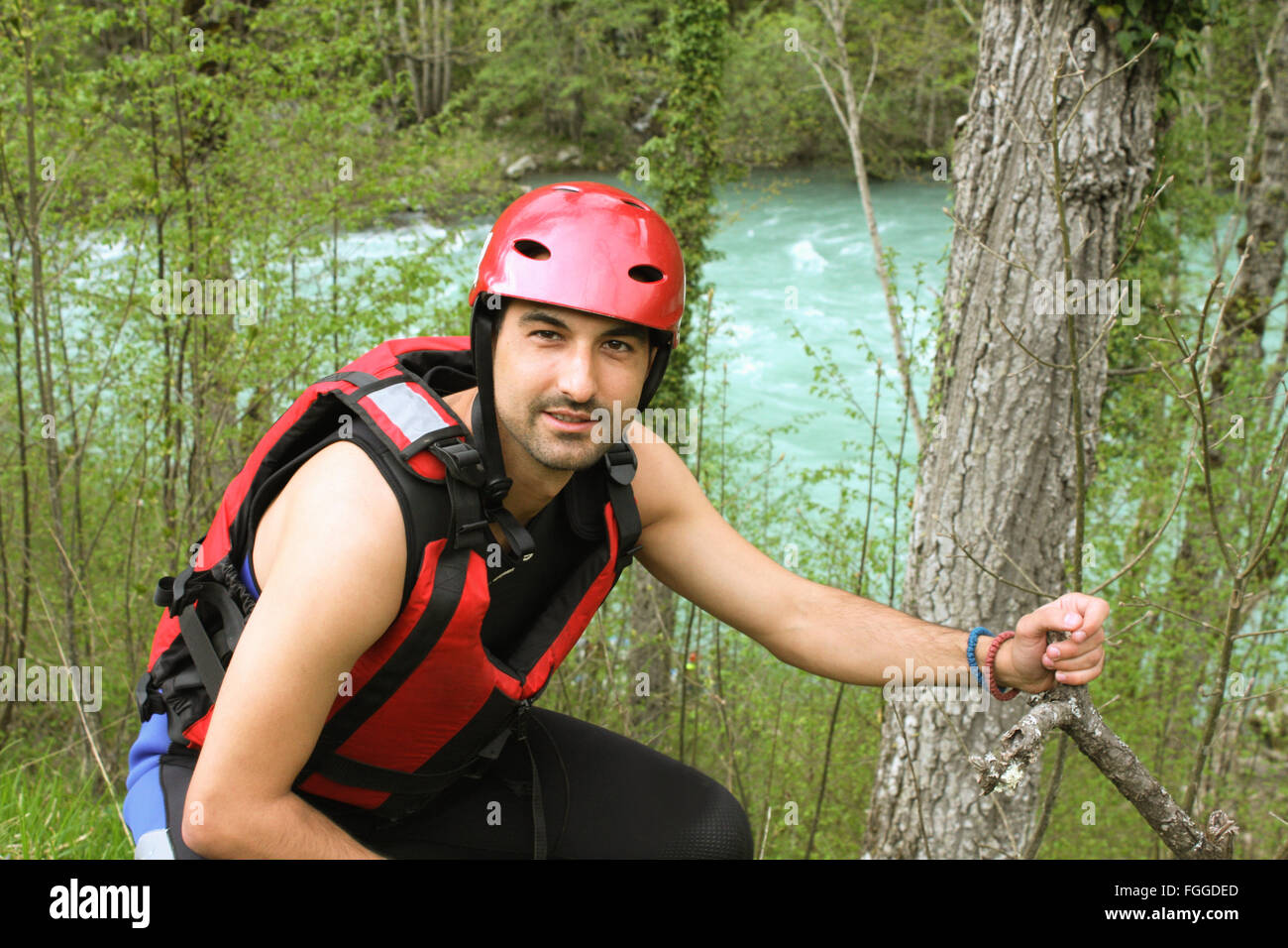 Adult man Wearing Water sport and rafting equipment Stock Photo - Alamy