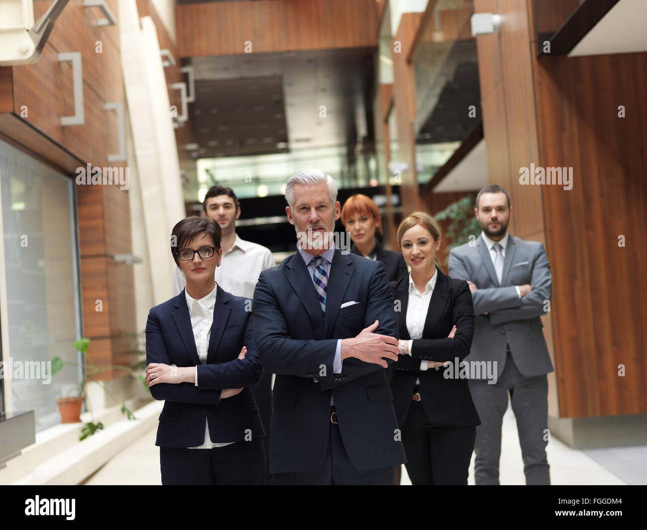 senior business man with his team at office Stock Photo - Alamy