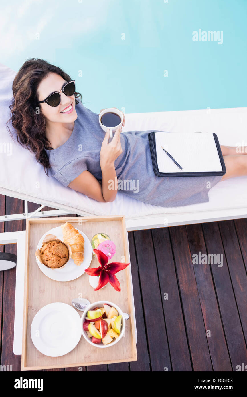 Young woman tea table hi-res stock photography and images - Alamy