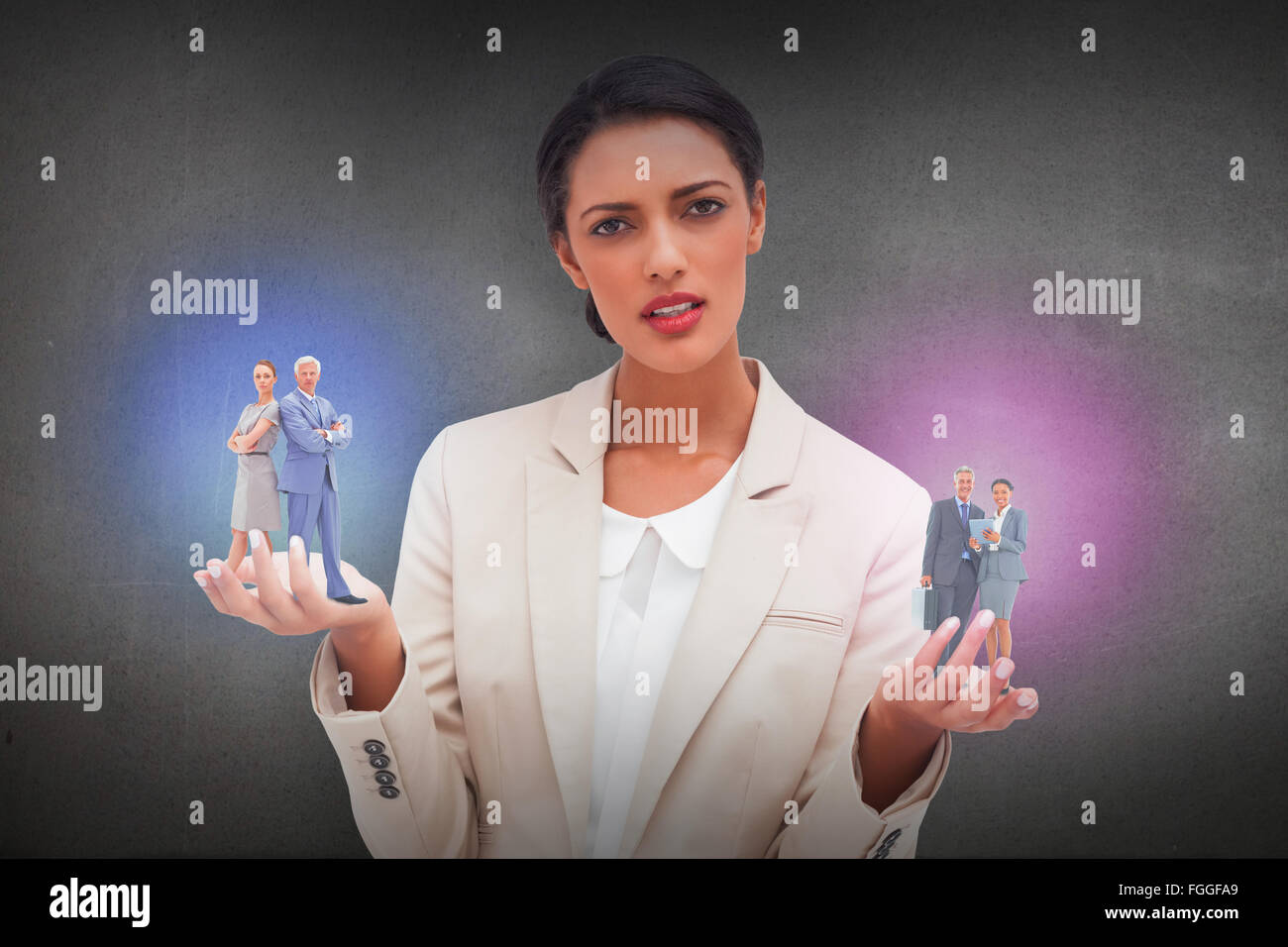 Composite image of serious businessman standing back to back with a ...