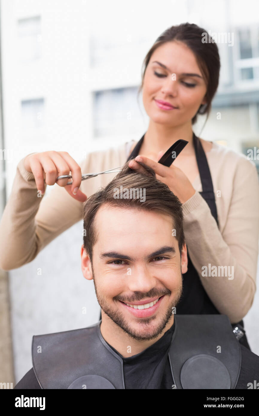 Man getting his hair trimmed Stock Photo - Alamy
