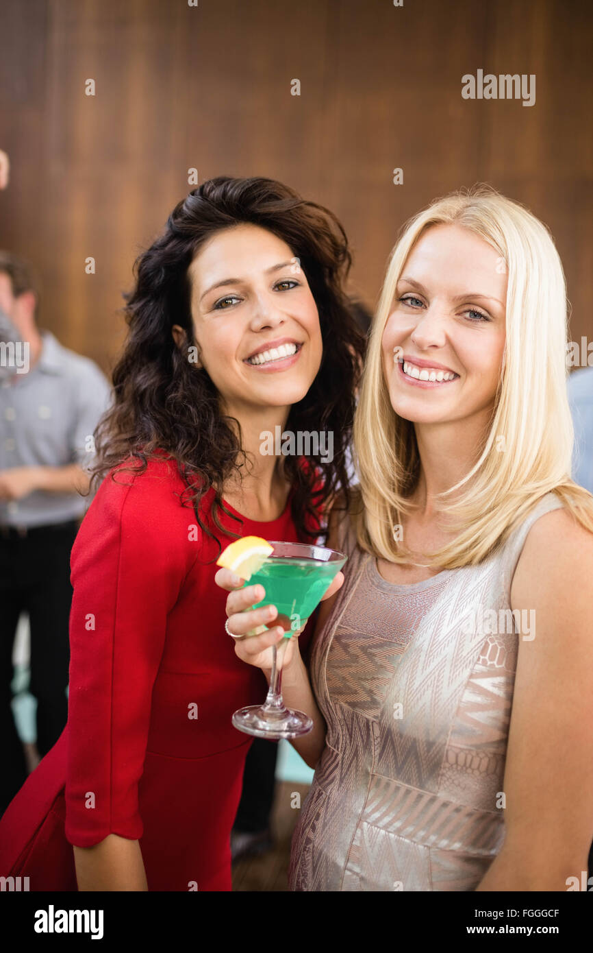 Portrait of beautiful women having drinks Stock Photo - Alamy