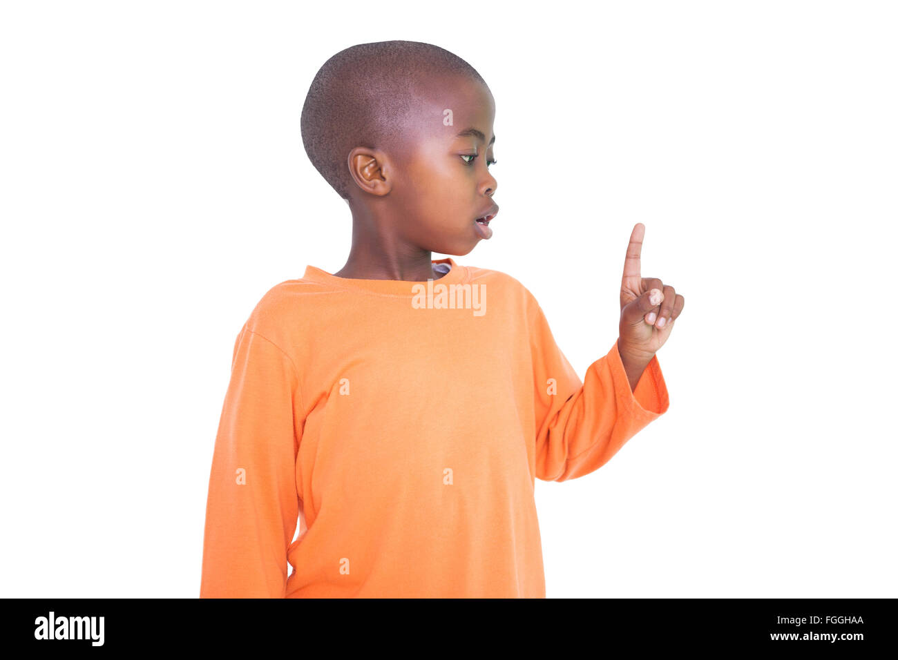 Cute boy pointing with finger Stock Photo - Alamy