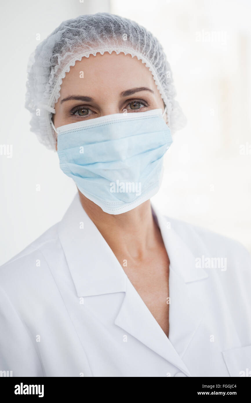 Doctor wearing a surgical mask Stock Photo - Alamy