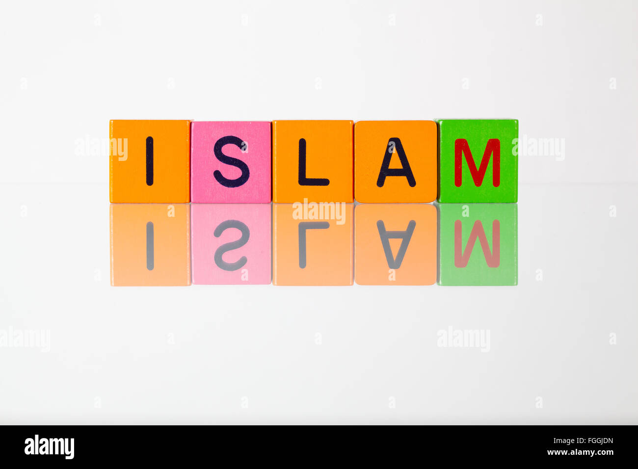Islam - an inscription from children's wooden blocks Stock Photo - Alamy
