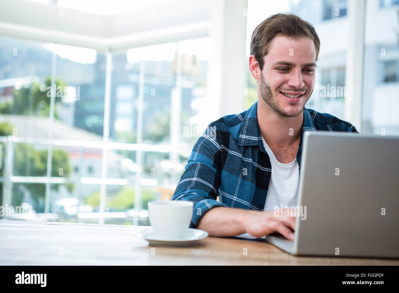 Man working laptop cup hi-res stock photography and images - Alamy