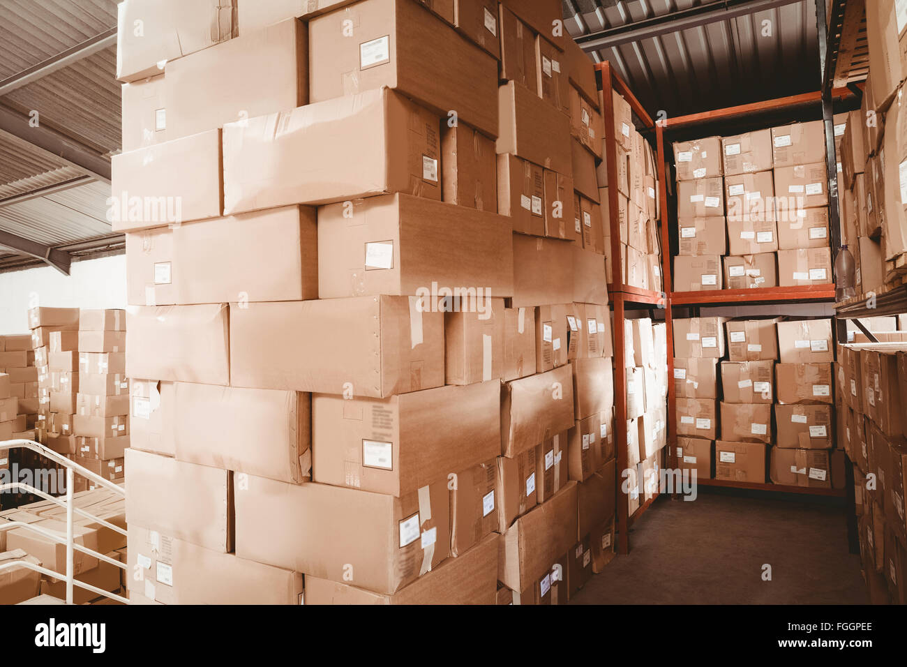 Shelves with boxes in warehouse Stock Photo - Alamy