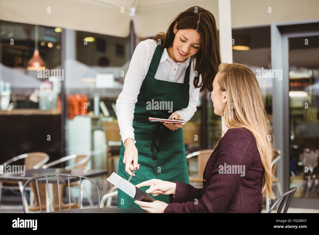 Woman female waitress server employee writing taking order hi-res stock ...