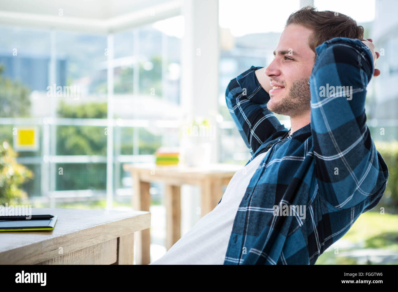 Stylish young man standing chair hi-res stock photography and images ...