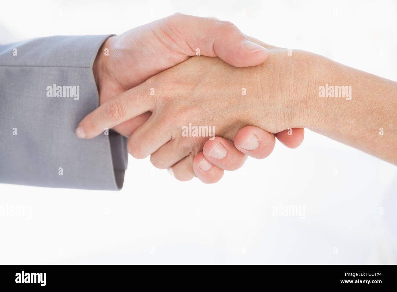 Close up of people shaking hands Stock Photo - Alamy