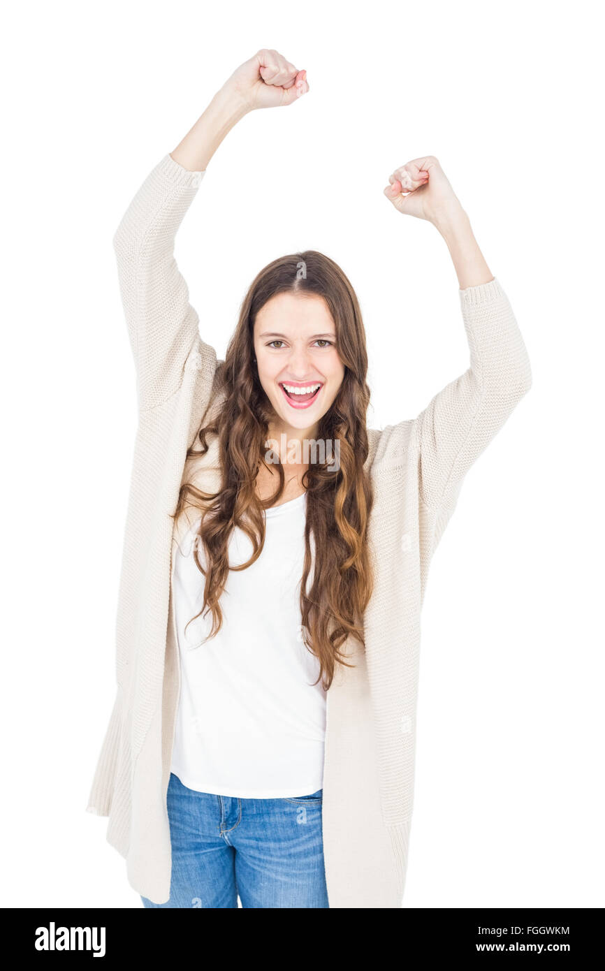 Triumphant woman raising fist Stock Photo - Alamy