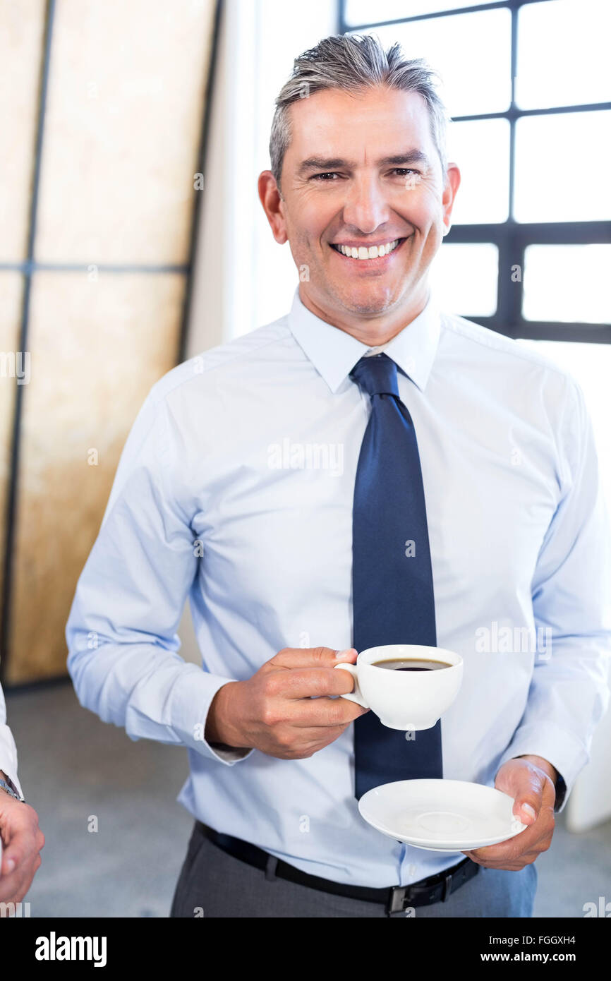 Business executive having a cup of tea Stock Photo - Alamy