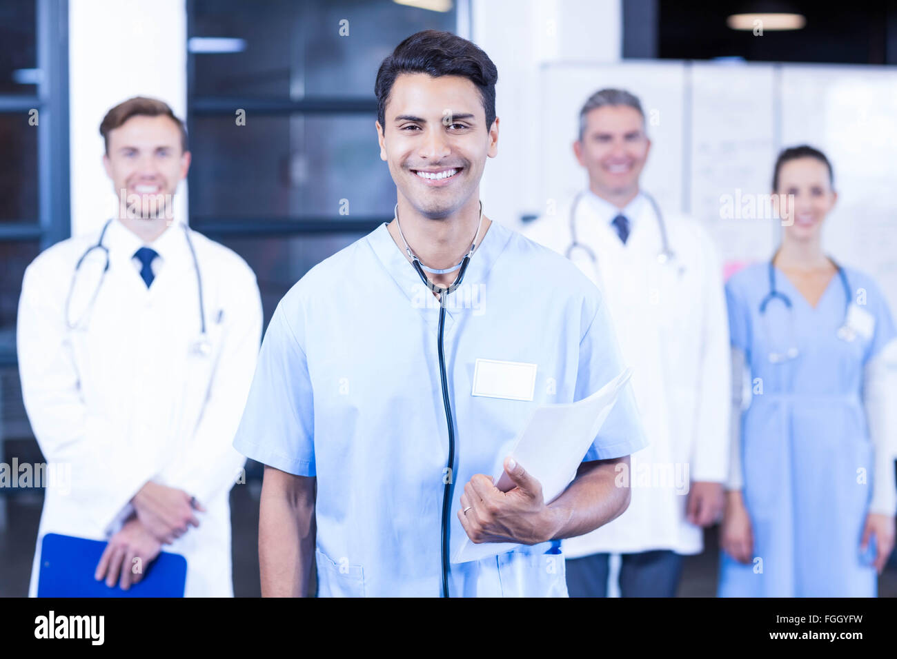 Portrait of medical team standing together Stock Photo - Alamy