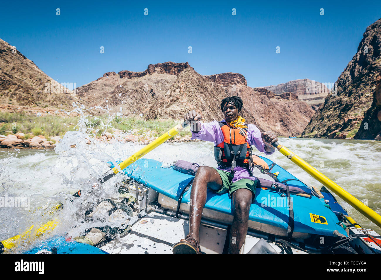 A man rows a raft in a rapid on the Colorado River Stock Photo - Alamy