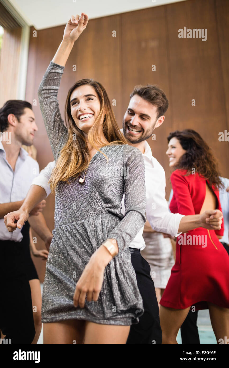 Group of young friends dancing Stock Photo - Alamy