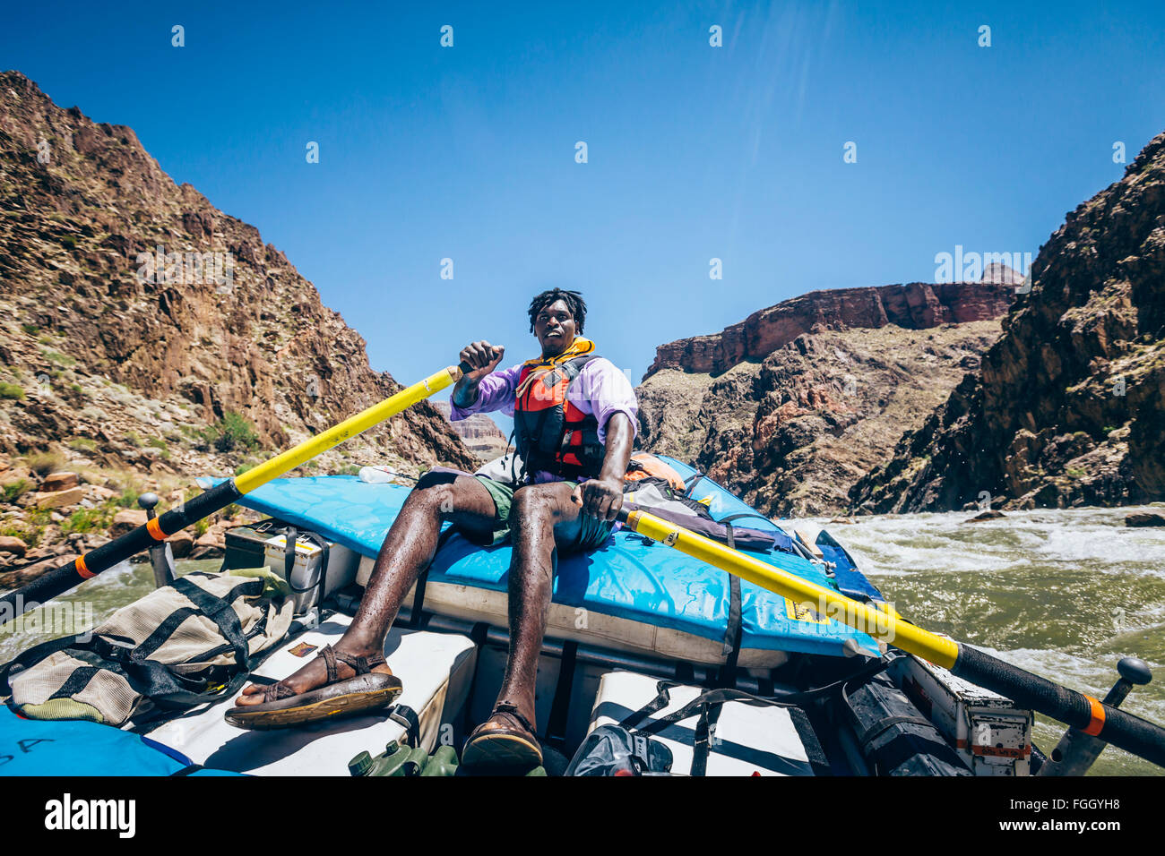 A man rows a raft in a rapid on the Colorado River Stock Photo - Alamy