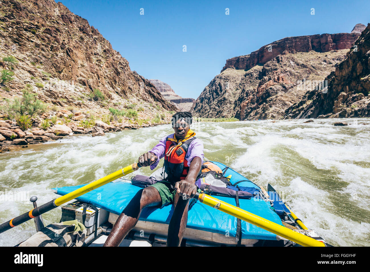 A man rows a raft in a rapid on the Colorado River Stock Photo - Alamy