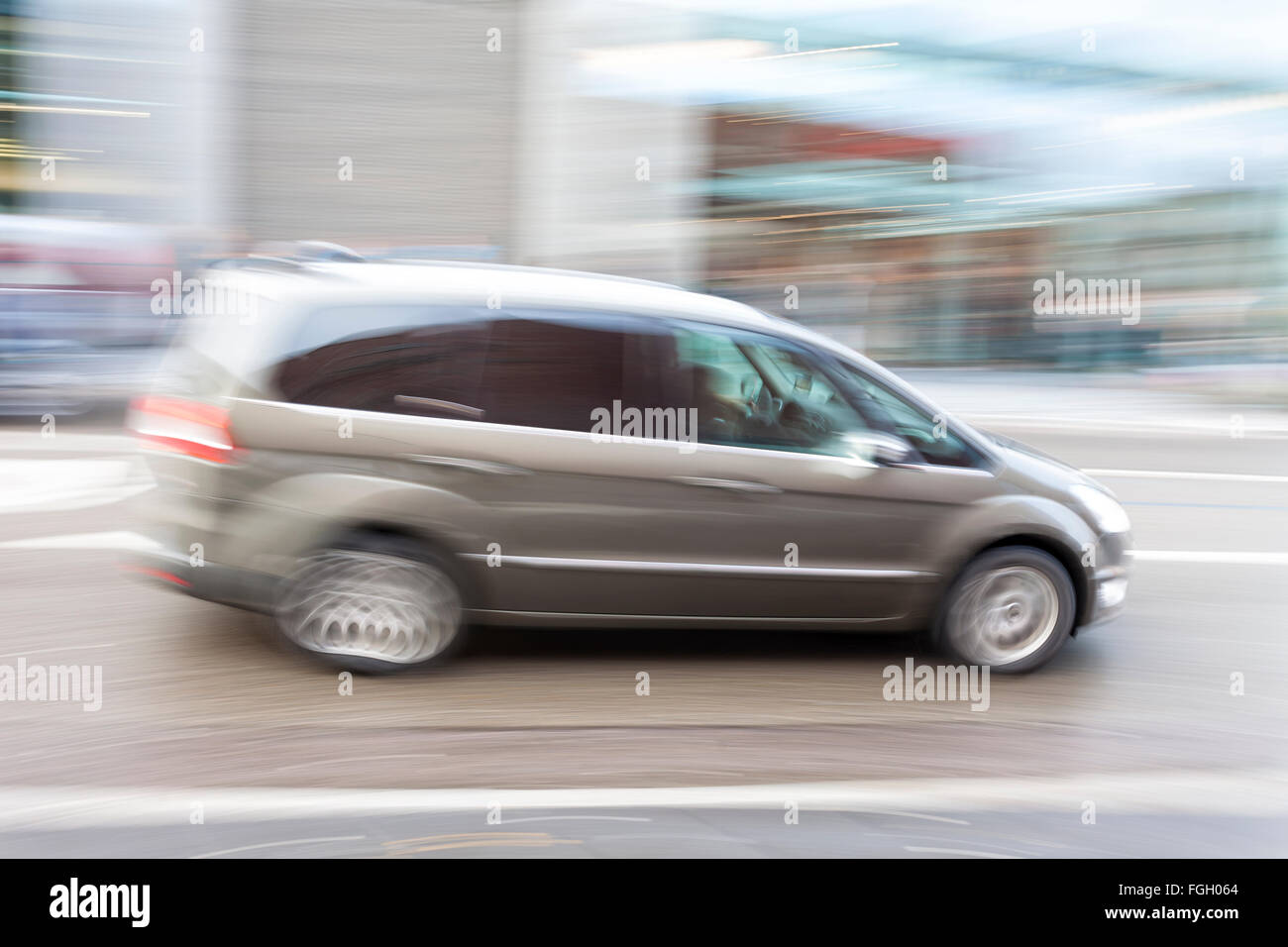 Car in motion blur, car driving fast in city Stock Photo - Alamy