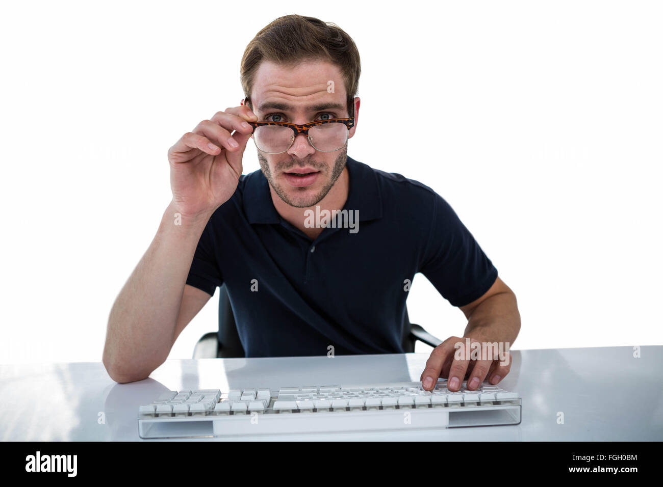 Handsome man using computer Stock Photo - Alamy