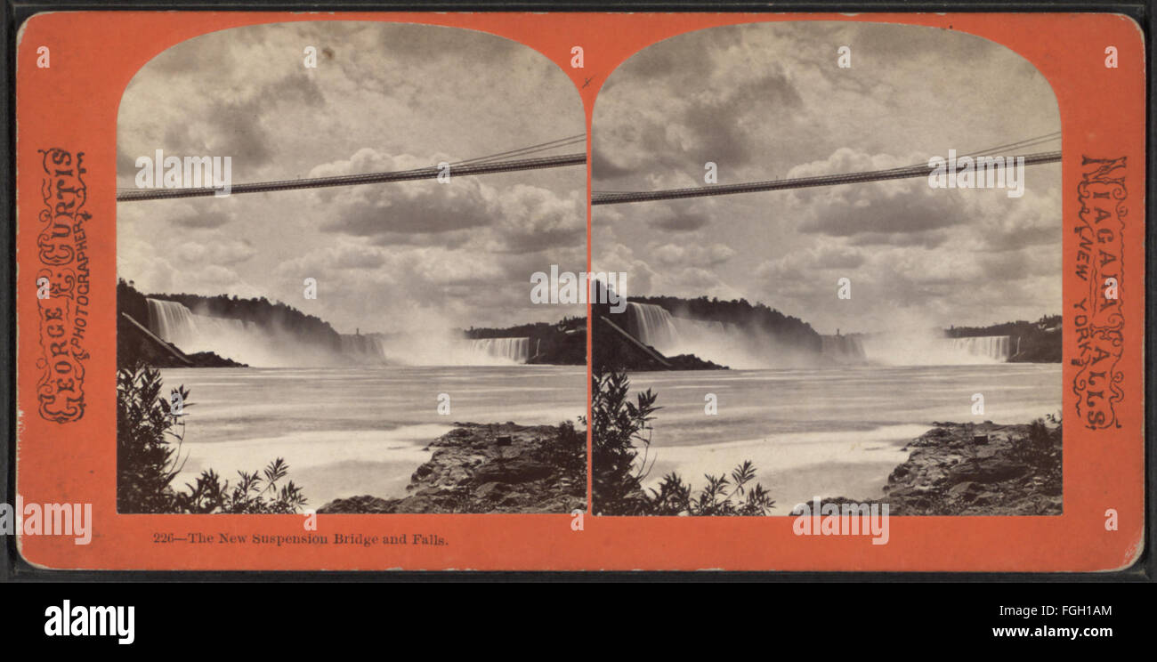 This photograph captures the newly built suspension bridge and the ...