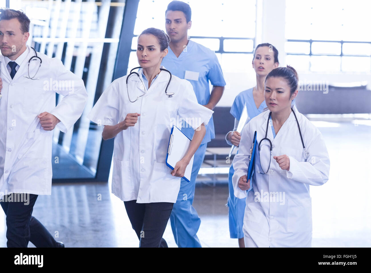 Doctors and nurses rushing for emergency Stock Photo - Alamy