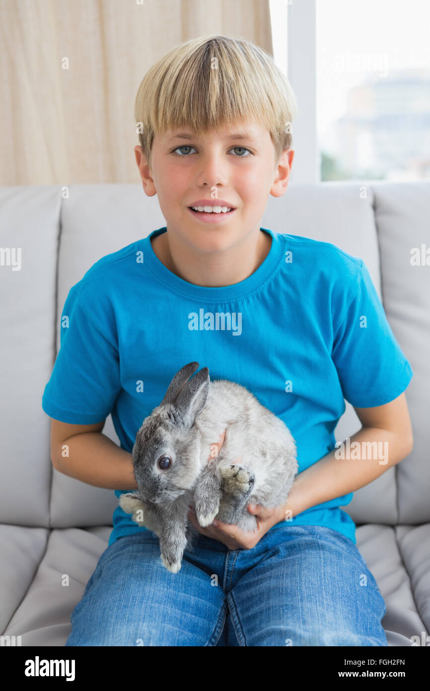Cute little boy with his pet bunny Stock Photo - Alamy