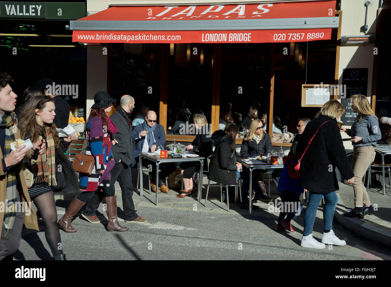 People eating at restaurant and tapas bar in Borough Market, London, UK ...