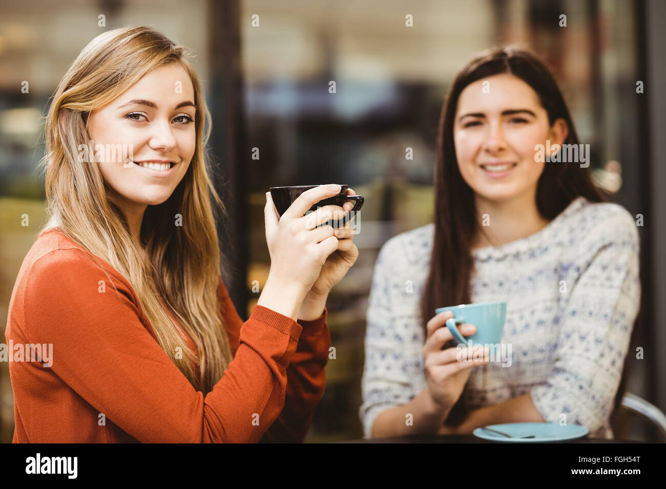 Friends chatting over coffee Stock Photo - Alamy