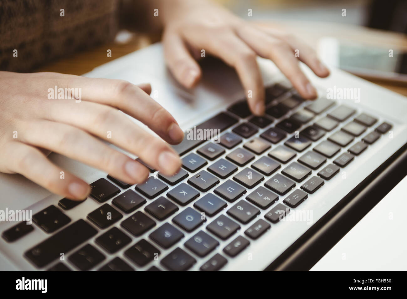 Typing hands on laptop close hi-res stock photography and images - Alamy