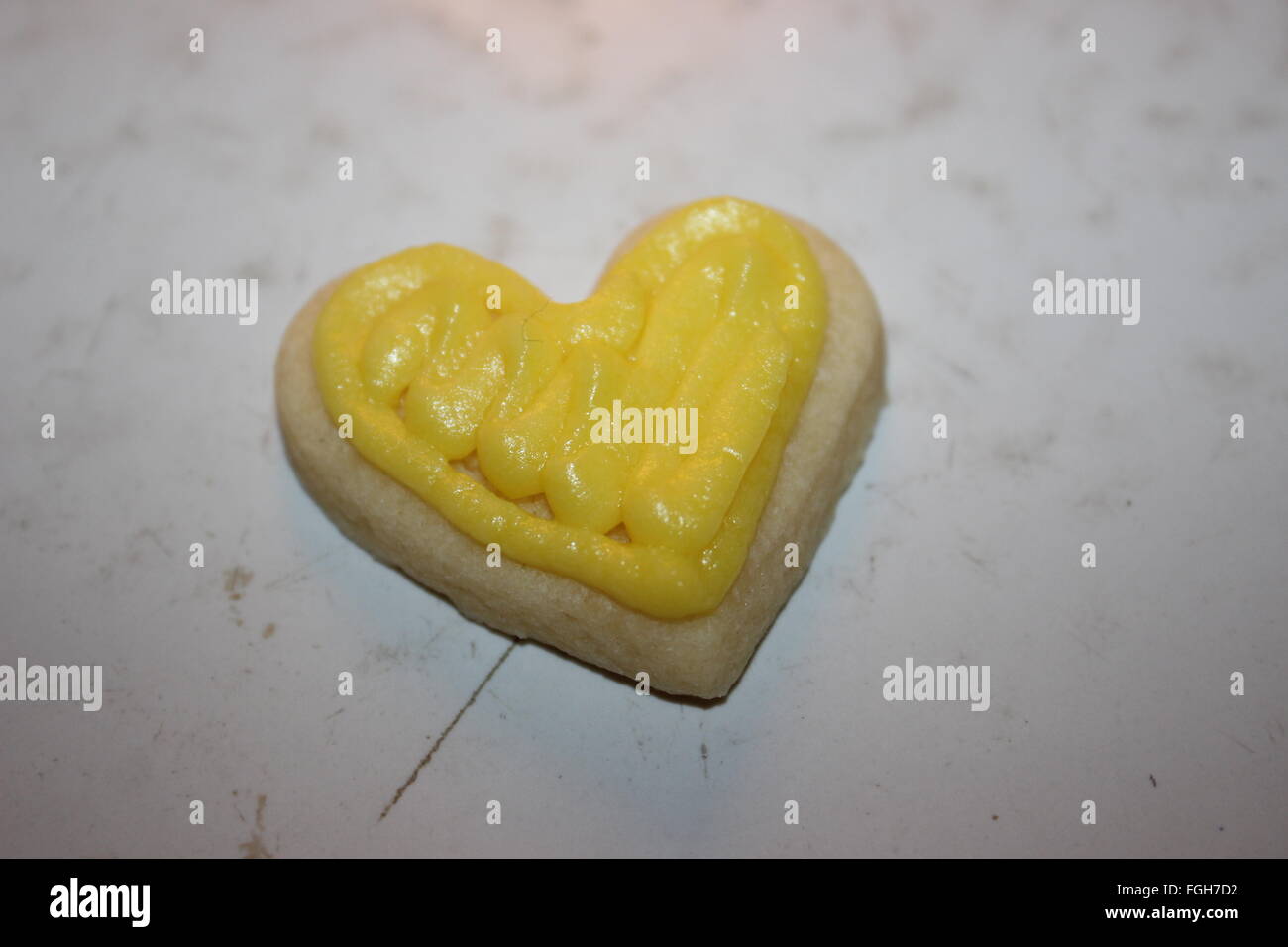 Butter Yellow Heart Cookie Stock Photo - Alamy