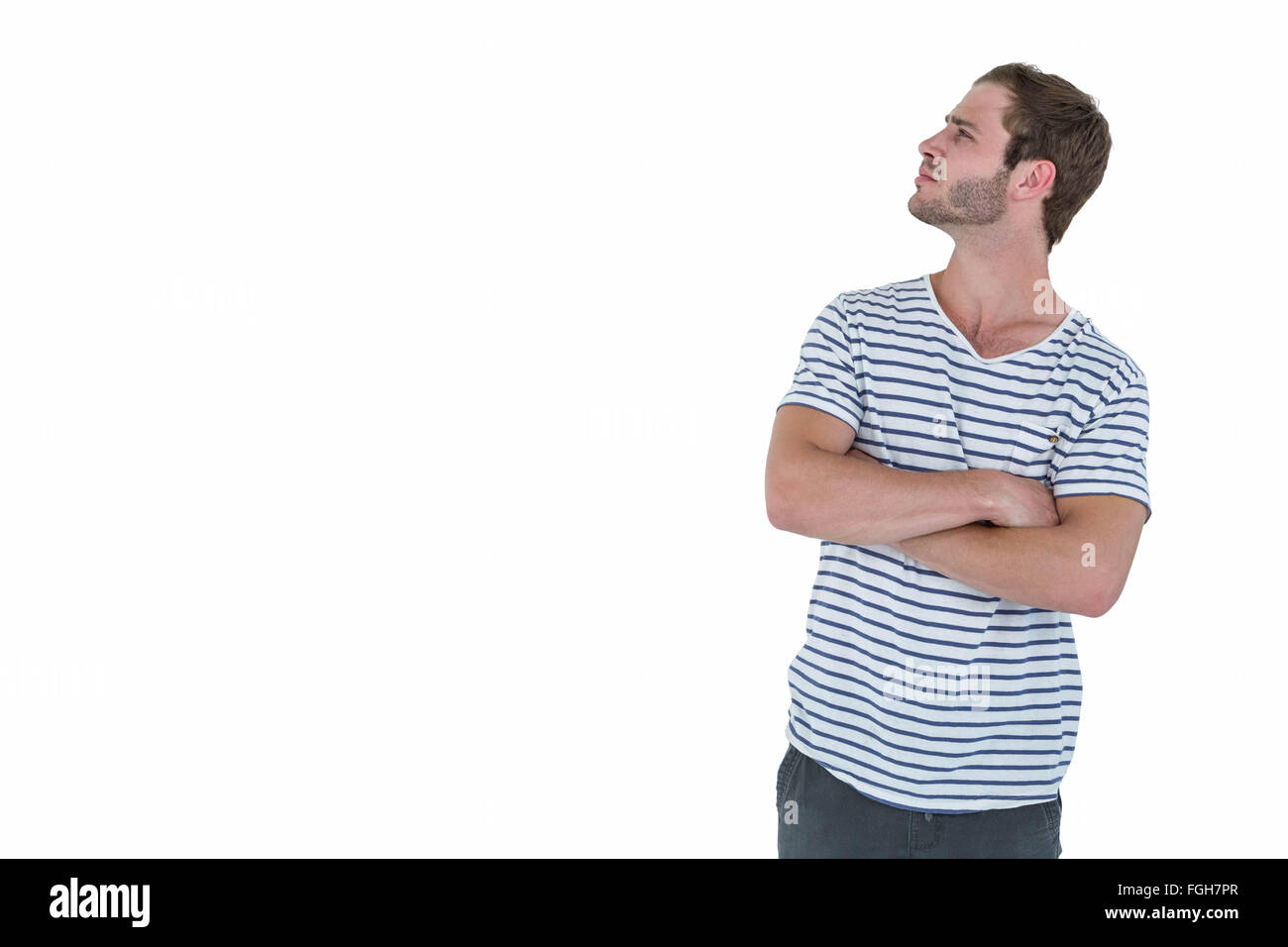 Hipster man folding his arms Stock Photo - Alamy