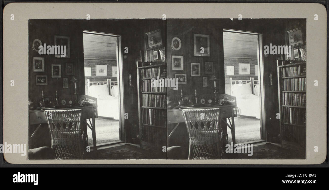 A photograph showing the view of a bedroom from a study, offering a ...