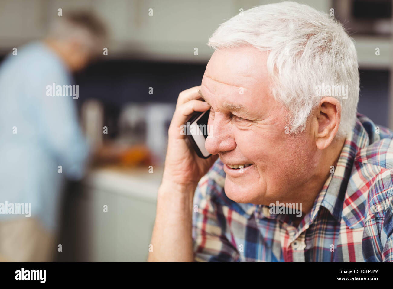 Senior man talking on phone Stock Photo - Alamy