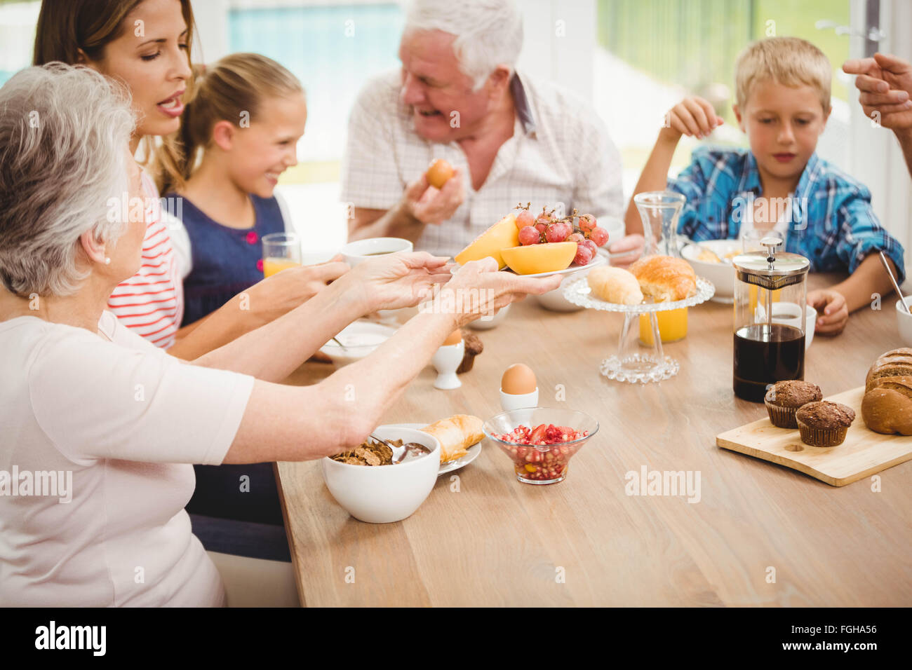 Family having breakfast Stock Photo - Alamy
