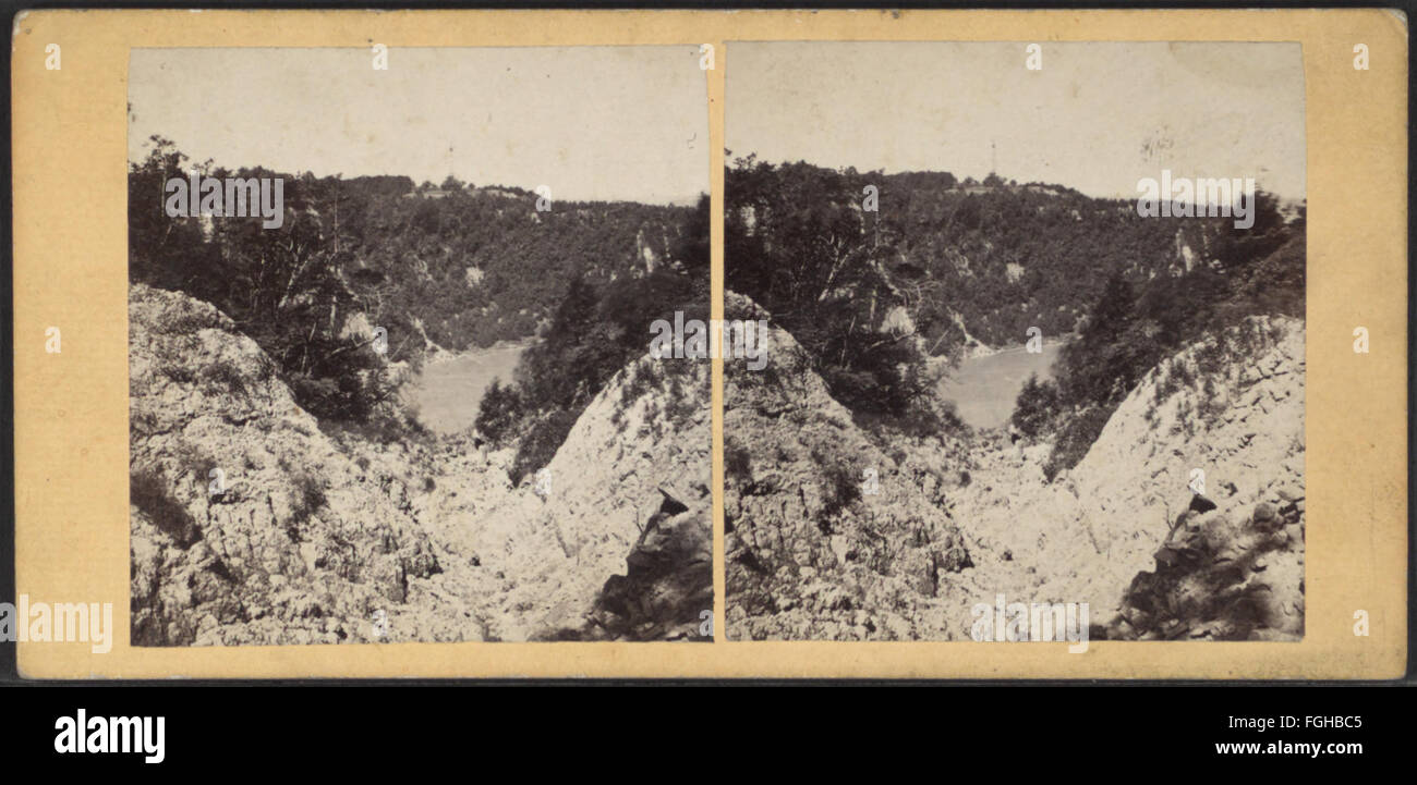 A photograph showing the Niagara River from the banks, captured by ...