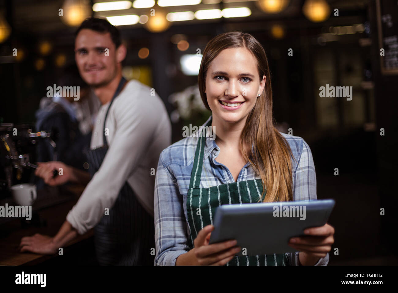 Male female barista using hi-res stock photography and images - Alamy