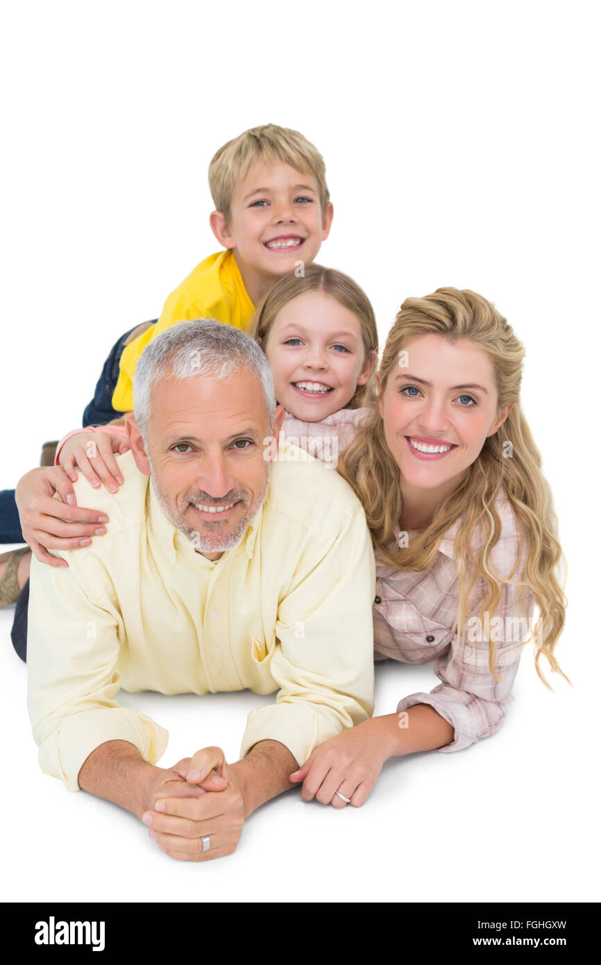 Happy family lying and smiling Stock Photo - Alamy