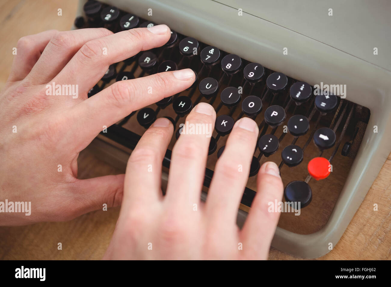 Close up of masculine hands typing on old typewriter Stock Photo - Alamy