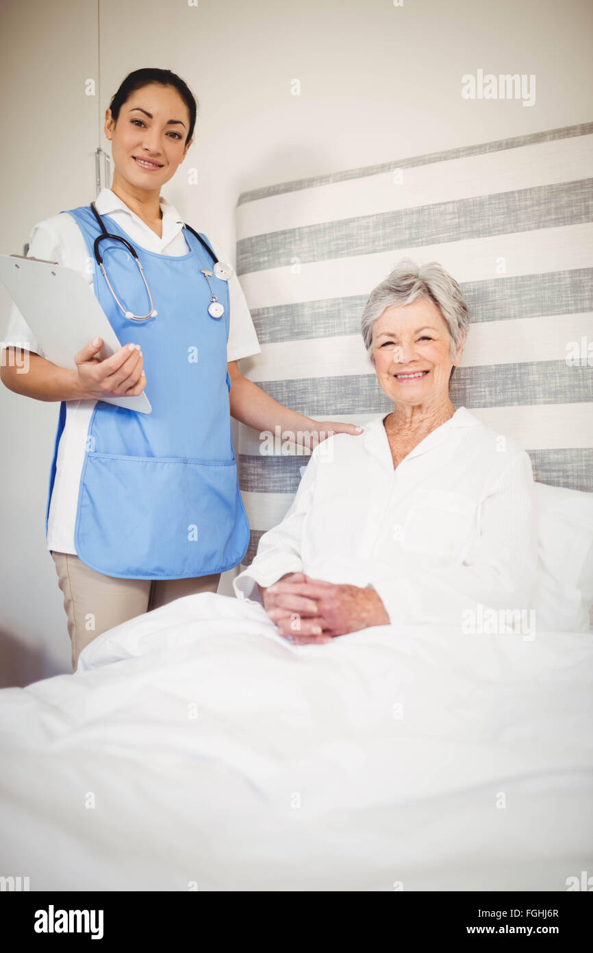 Portrait of nurse and senior woman Stock Photo - Alamy