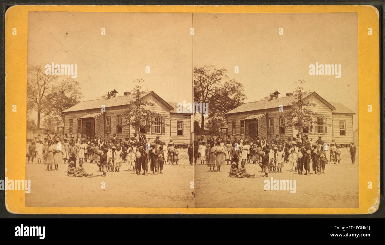 This photograph depicts the Colored School, capturing the structure and ...