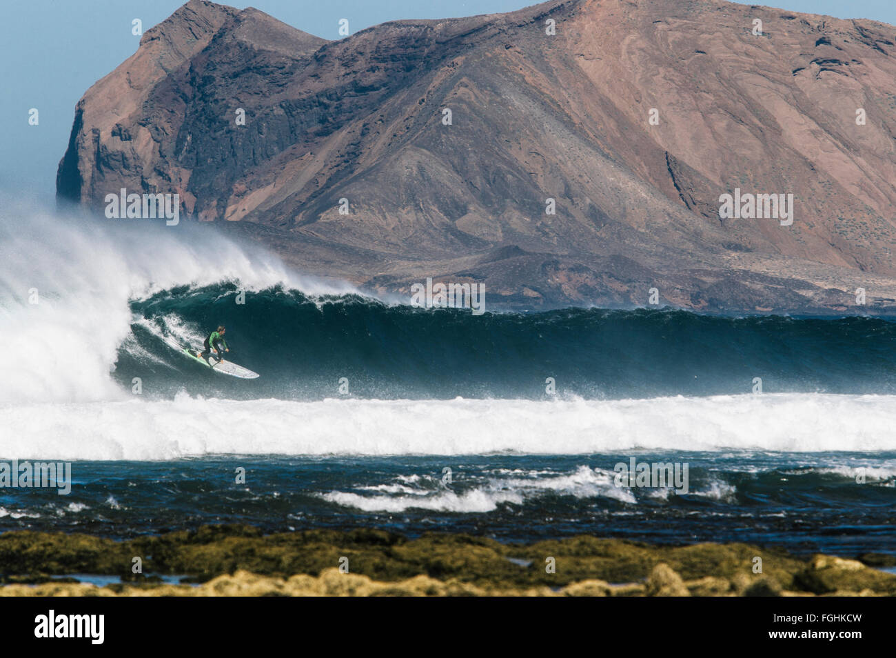Big wave surferVilaytasurfs on a SUP board Stock Photo - Alamy