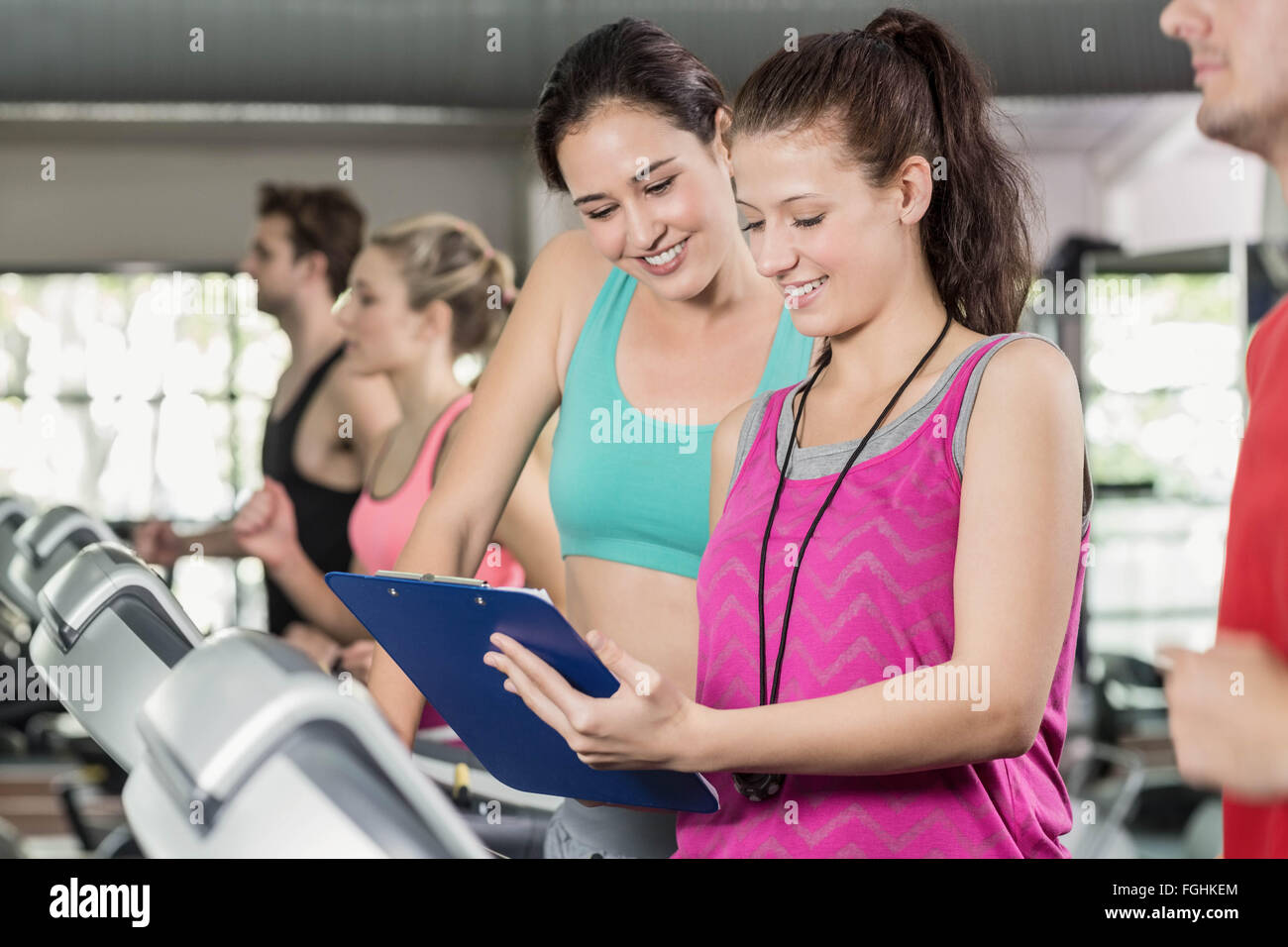 Female personal trainer showing hi-res stock photography and images - Alamy