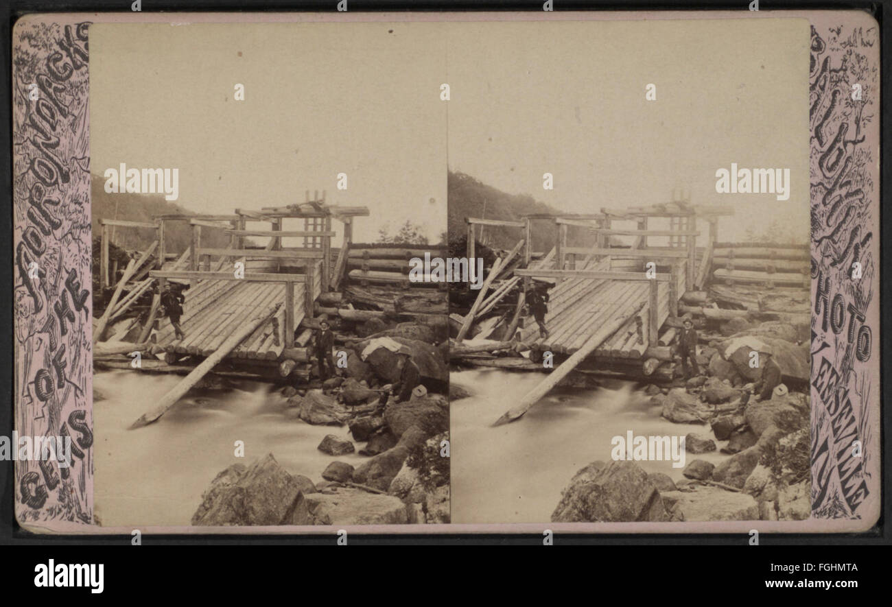 A photograph by G. W. Baldwin showing a dam with a chute, emphasizing ...