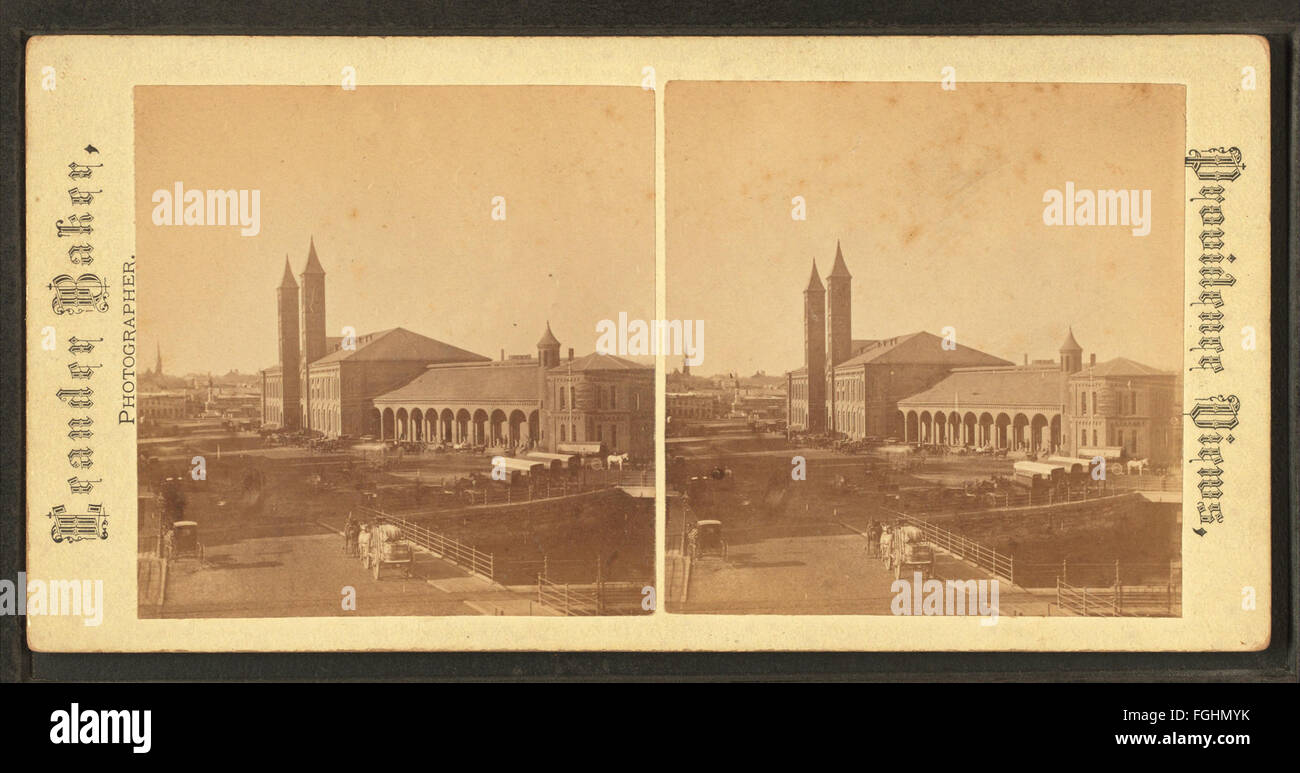 A photograph of the depot and railroad square, taken by Leander Baker ...